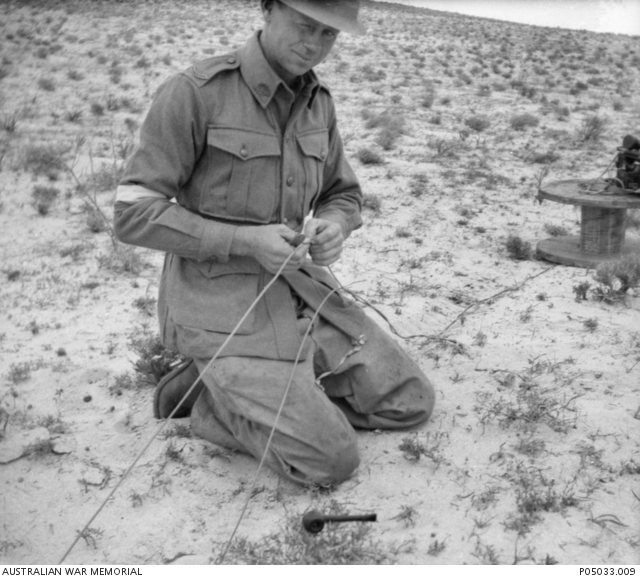 An unidentified Australian signaller from the 6th Division, at work in ...