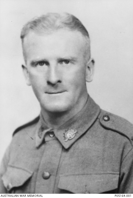 Studio portrait of VX61482 Private (Pte) Rowland Robert Dando, 2/10th ...