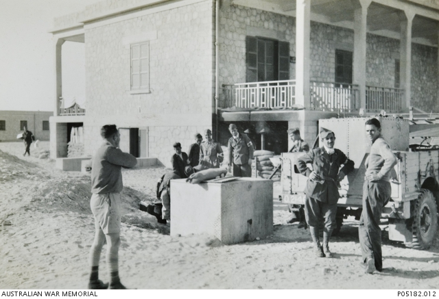 "Italian prisoners Mersa Matruh getting their water tank filled. They ...