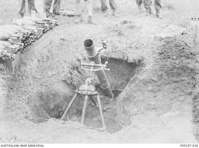 A 4.2 inch Australian mortar in a pit reading for firing, possibly at ...