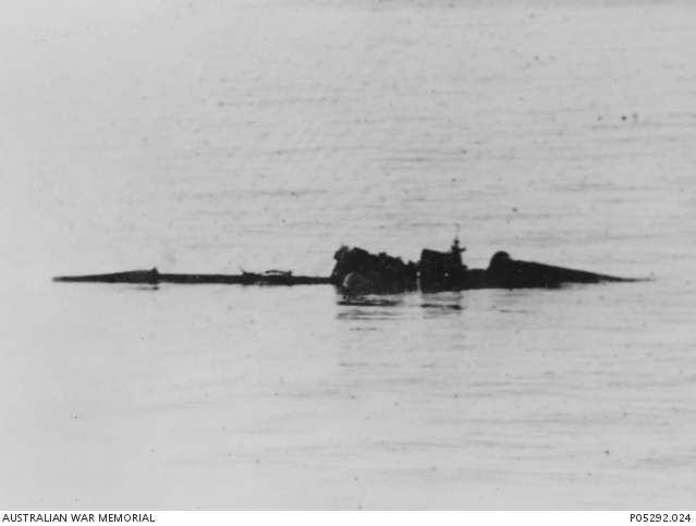 A wrecked aircraft sinks in the waters off Guadalcanal during the ...