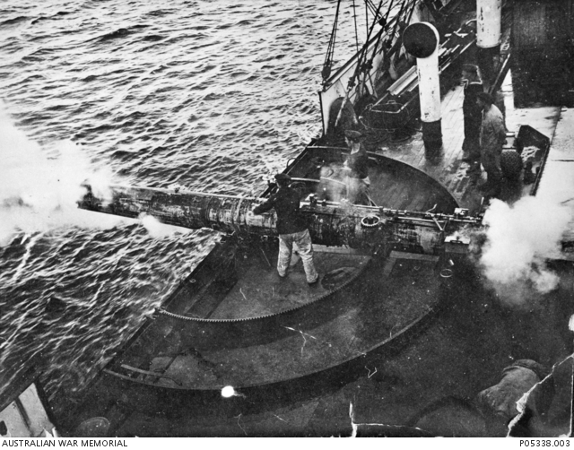 Unidentified sailors fire a torpedo aboard the German armed merchant ...
