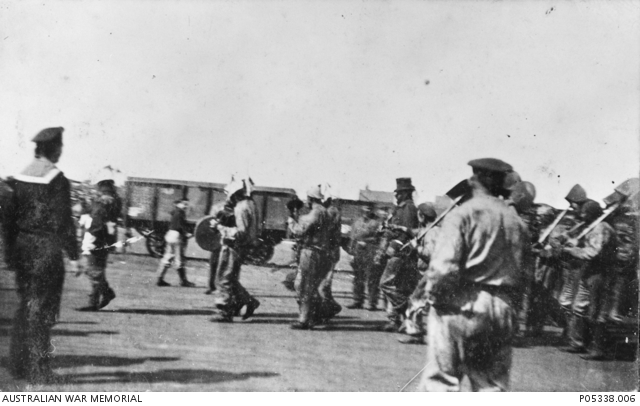 A parade on the Kiel docks to farewell the German armed merchant raider ...