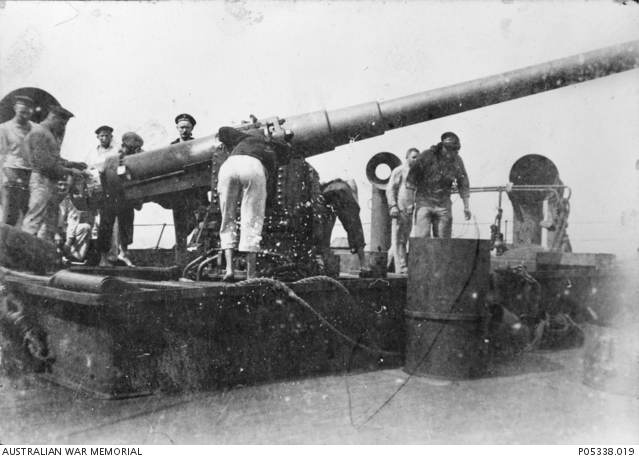 Unidentified sailors prepare to fire the 10.5 cm gun aboard the German ...