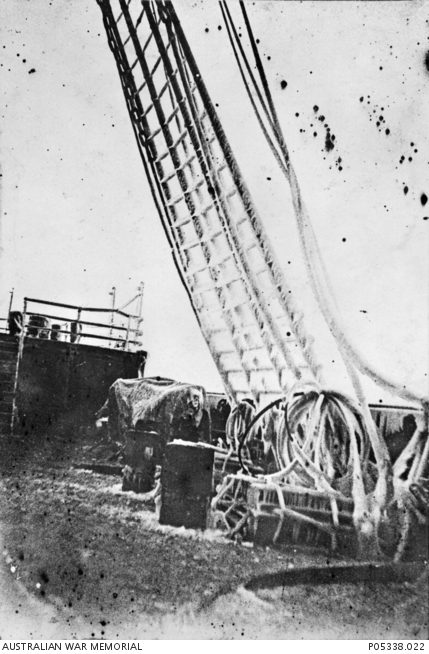 Ice covers the deck and ratlines of the German armed merchant raider ...