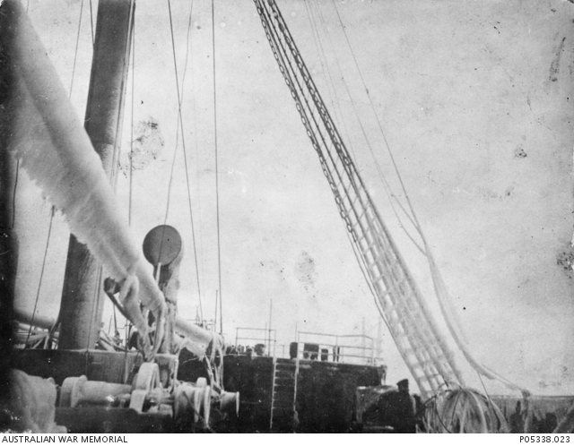 Ice covers the deck and ratlines of the German armed merchant raider ...