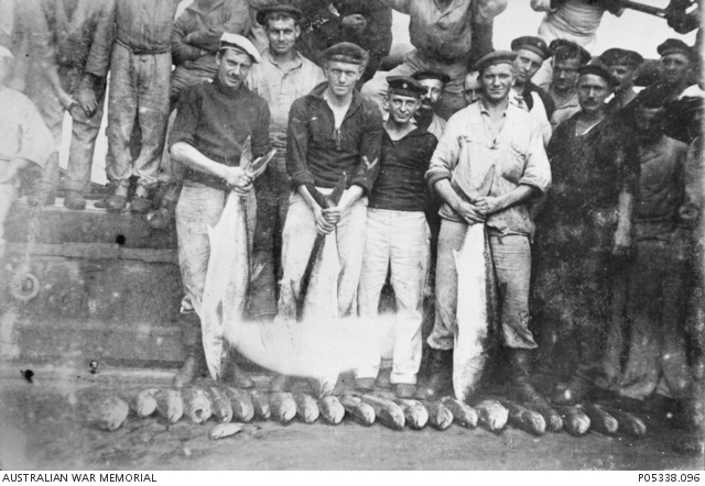 A group of unidentified sailors aboard the German armed merchant raider ...