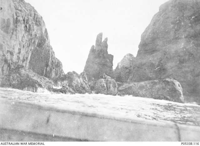 View of a rocky coastline as seen from a rowboat from the German armed ...