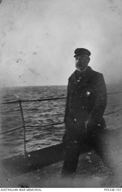 An unidentified captain from a captured ship, now a prisoner, walks ...