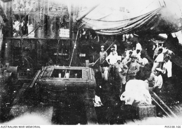Japanese crew gather on the deck of the German armed merchant raider ...