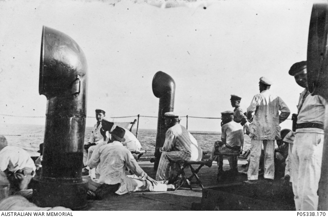 Prisoners pass time on the deck of the German armed merchant raider ...