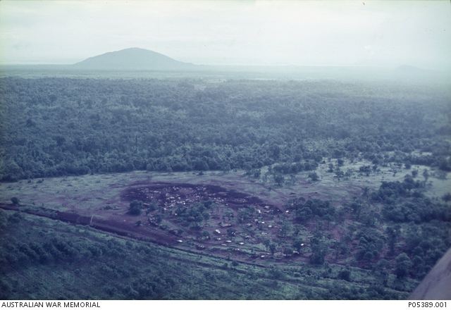 Aerial view of Fire Support Base (FSB) Pamela, with features of the May ...