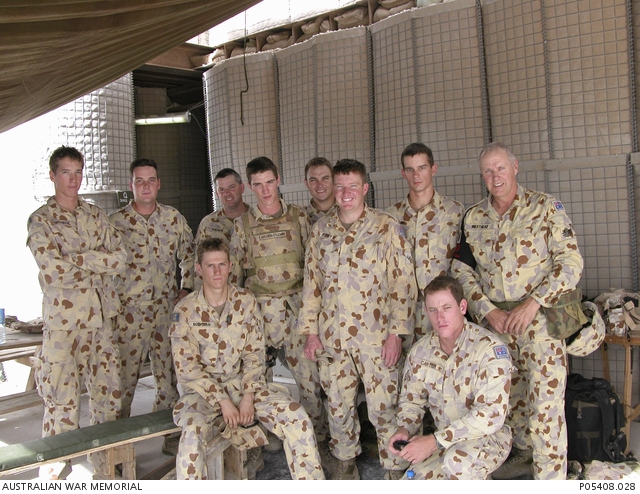 Informal group portrait of members of 5th/7th Battalion, The Royal ...