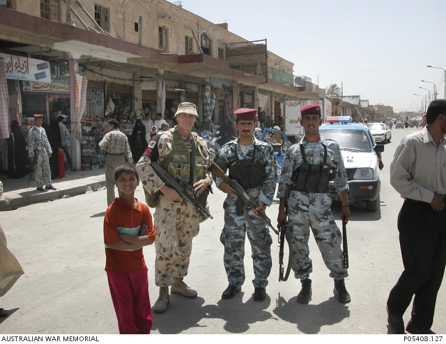 Informal portrait of Warrant Officer Class 1 (WO1) Greg Westhead (left ...