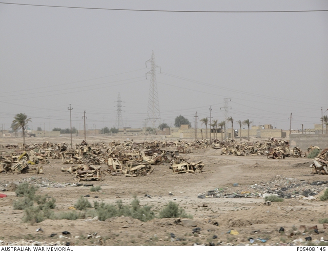 Iraqi military wrecks from the First Gulf War along one of the road in ...