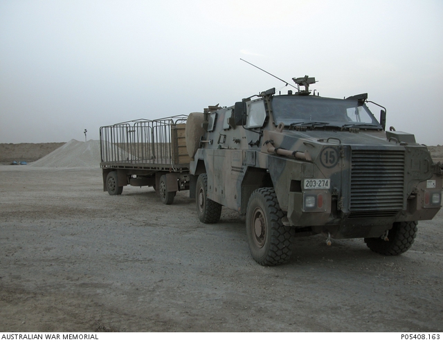 An Australian Bushmaster vehicle (Army registration number 203274) with ...