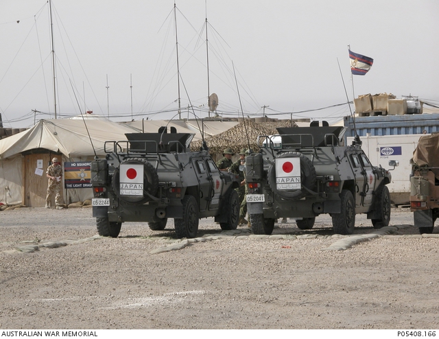 Two Japanese armoured vehicles parked at Camp Smitty, with the ...