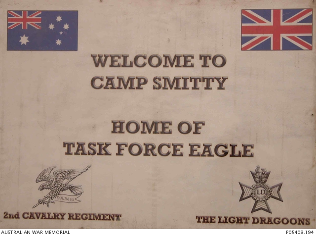 A sign at the entrance to Camp Smitty, which reads 'Welcome to Camp ...