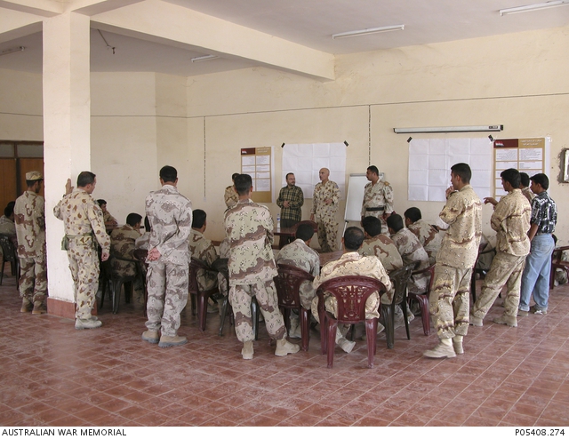 Members of the 603rd Battalion, Iraqi Army, listen intently as ...