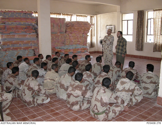 Members of the 603rd Battalion, Iraqi Army, listen intently as ...