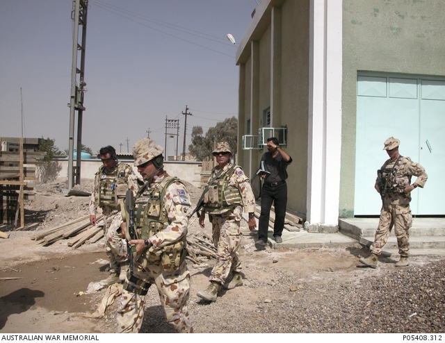 Captain Tony Smith (back, left), Warrant Officer Class 2 Paul Petter ...