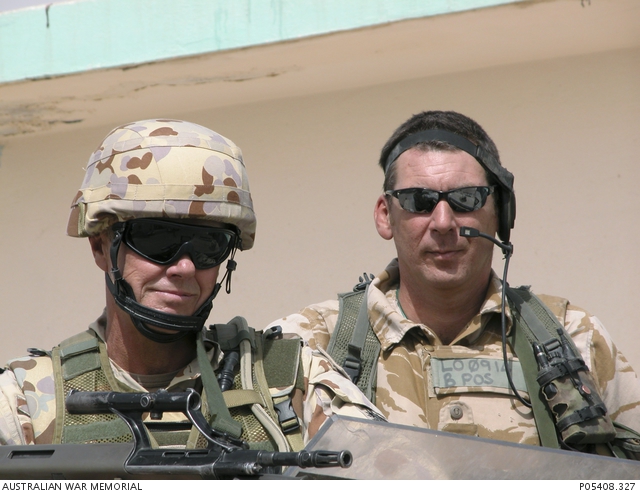Informal portrait of Warrant Officer Class 1 (WO1) Greg Westhead (left ...