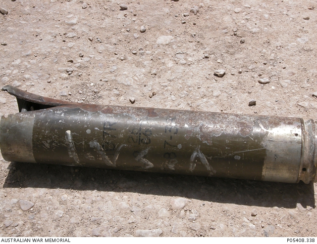 A 107mm mortar round that had been fired into Camp Smitty. Camp Smitty ...