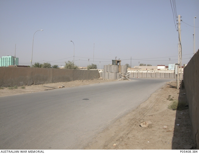 The heavily reinforced rear gate of the As Samawah council building ...