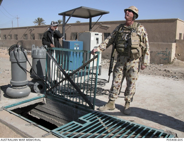 Captain Tony Smith, a member of the Civil Military Co-operation (CIMIC ...
