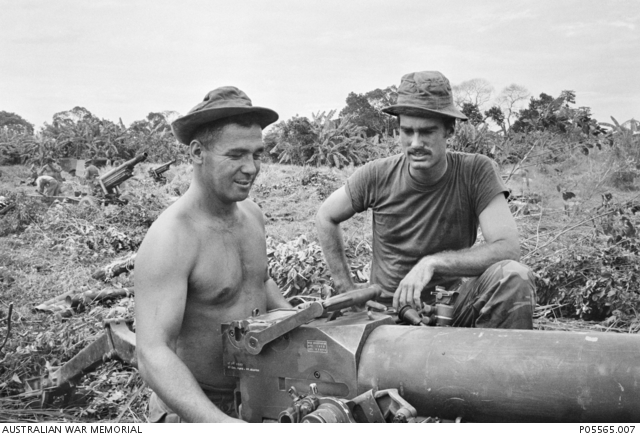 Gun Sergeant, Trevor A Pilcher (left), standing behind an 105 mm L5 ...