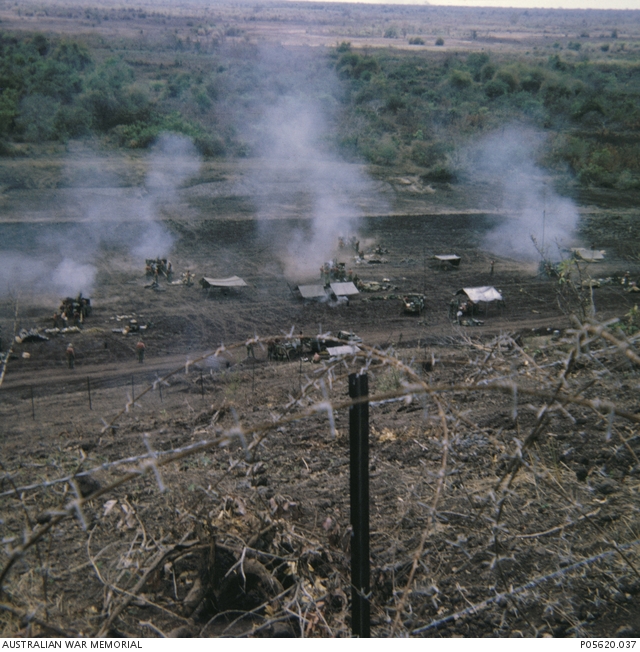 105mm howitzers carry out a fire mission from the Horseshoe, a Fire ...