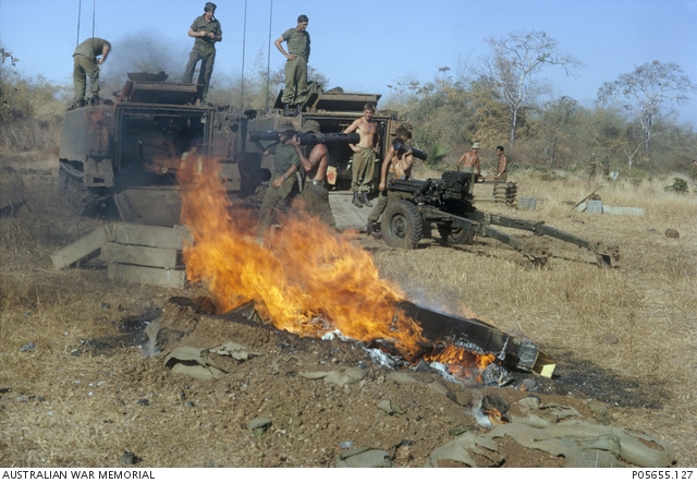 Members of the Australian Army disassemble a 105mm Pack Howitzer while ...