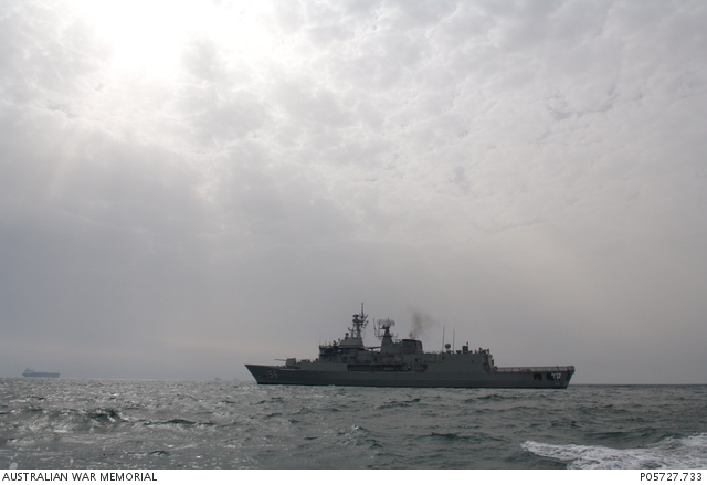 View of HMAS Toowoomba from the waterline. | Australian War Memorial