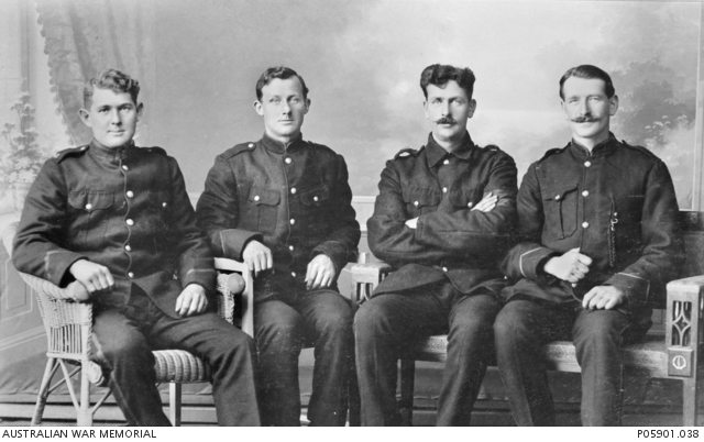 Studio portrait of four unidentified allied Prisoner of War (POW) at ...