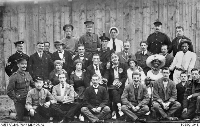 Outdoor portrait of a large group of 29 unidentified allied Prisoners ...