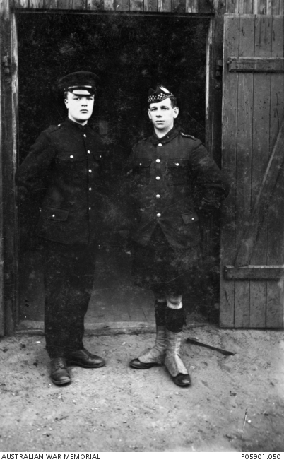 Outdoor portrait of two unidentified British Prisoners of War (POW) at ...