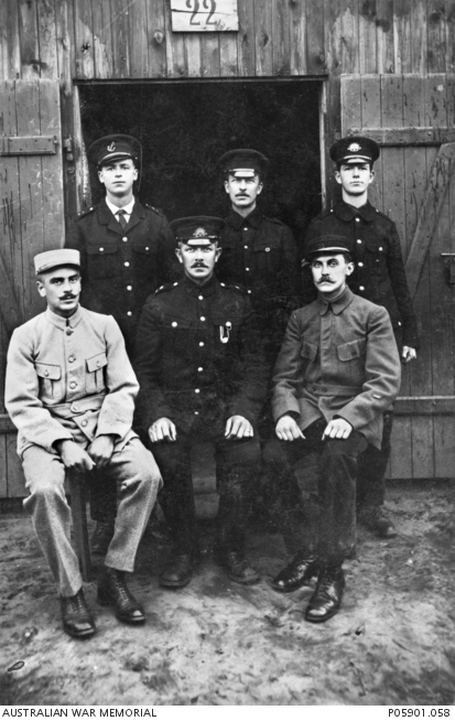 Outdoor portrait of six Allied Prisoners Of War (POW) at Schneidemuhl ...