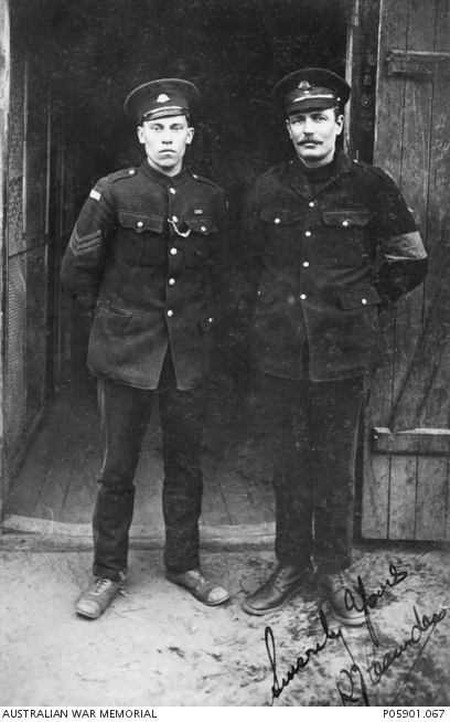 Outdoor portrait of two Australian Prisoners of War (POW) at a POW camp ...