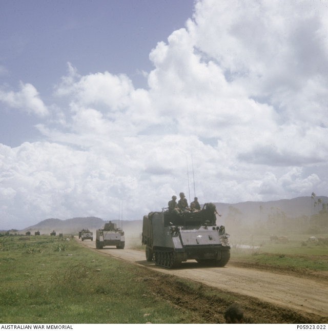 A convoy of M113A1 Armoured Personnel Carriers on Route 2 near Nui Dat ...