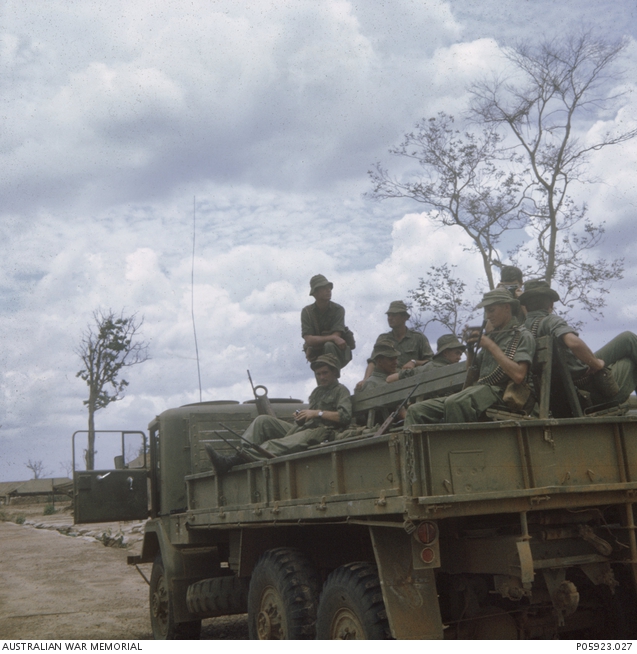 Australian infantry sitting in an International Mk V 6x6 GS cargo truck ...
