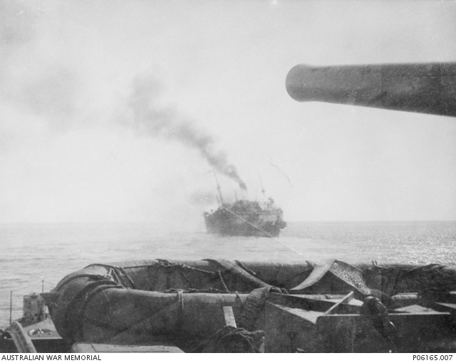 View from HMAS Quiberon towards the heavily damaged SS Strathallan. The ...