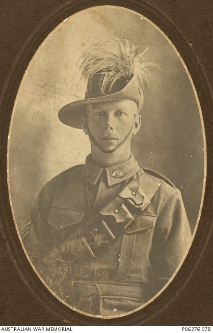 Head and torso studio portrait of young Sergeant in uniform, the ...