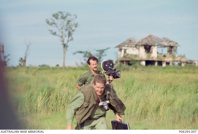 Raeburn Trindall and the RAAF photographer based at Vung Tau boarding a ...