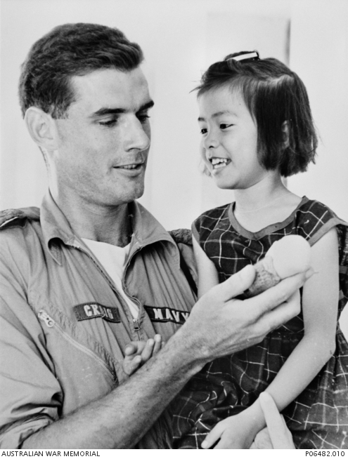 Lieutenant (Lt) Andrew Hugh Craig with a Vietnamese girl and a small ...
