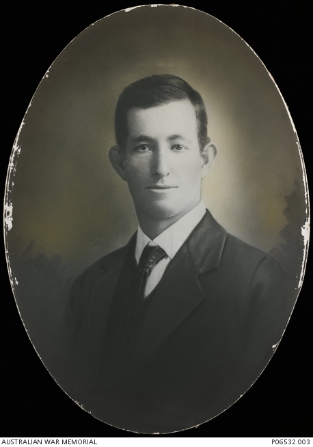 Studio portrait, taken prior to enlistment, of 4517 Private (Pte) Percy ...