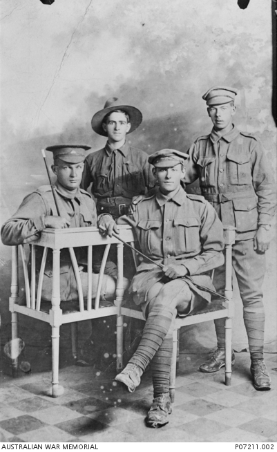 Studio portrait of four members of the 1st AIF. Identified seated at ...