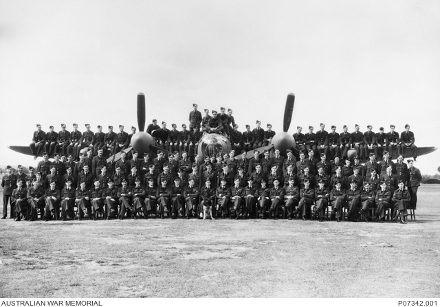 Group portrait of members of 540 Squadron RAF, in front of and on top ...