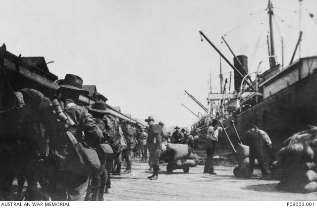 Soldiers march along the quayside during the embarkation of the 5th ...