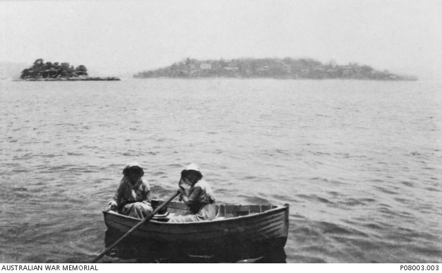 Two female friends or relatives of an embarking soldier who are ...