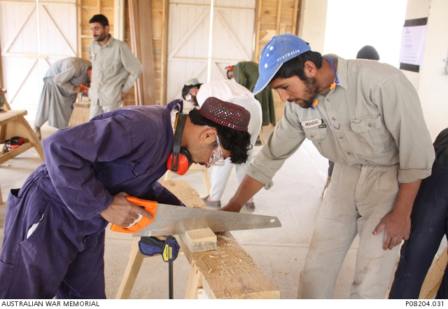 Afghan men and youths undertake training at an ADF Trade Training ...